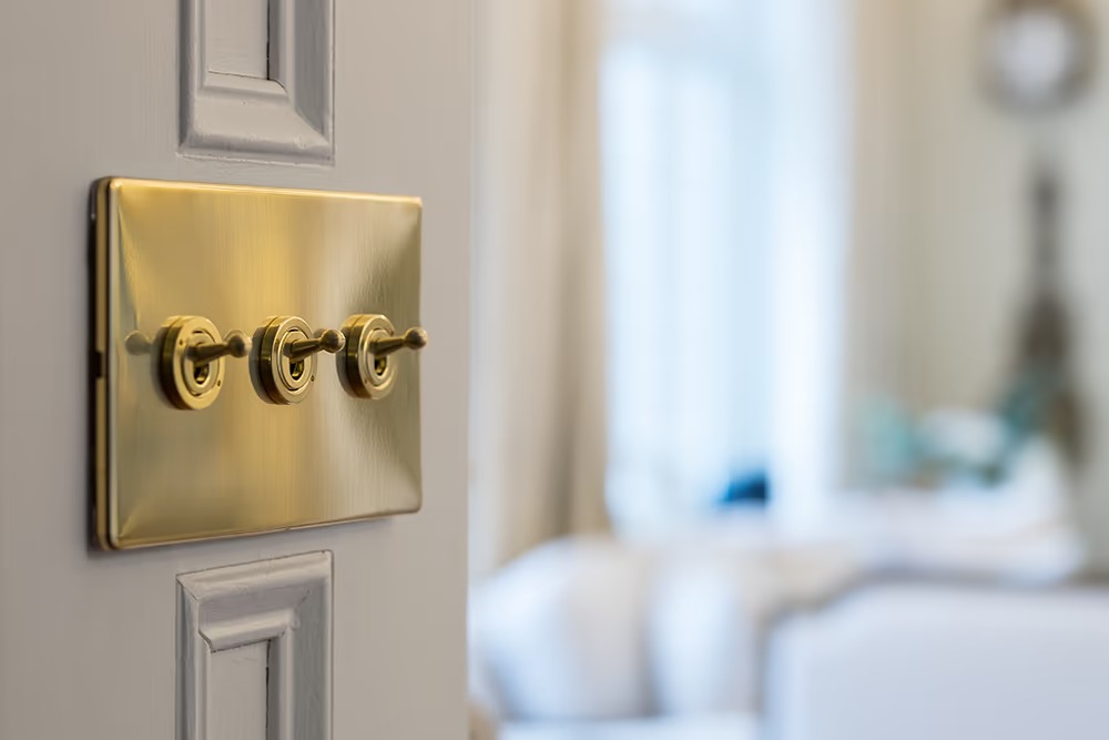 The Savoy Collection Brushed Brass 3 Gang 2 Way Toggle Switch Screwless